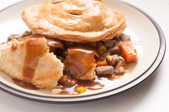beef meat pie with flaky crust Stock Photo by wirestock | PhotoDune