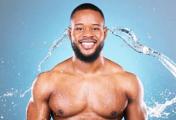 Muscle, strong and water splash for black man cleaning, hygiene and ...
