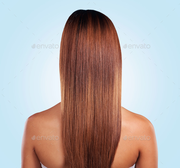 Back, hair care and beauty of black woman in studio isolated on a blue ...