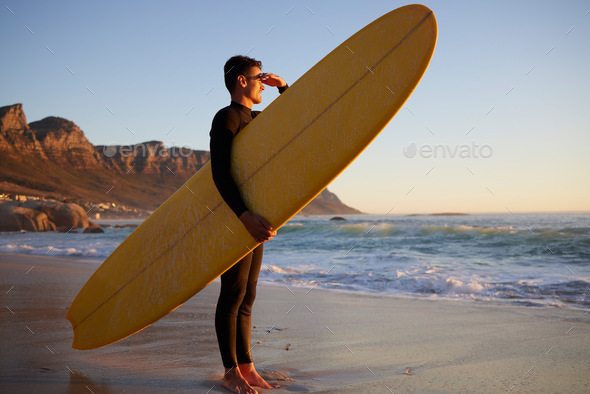 Surfer, man and beach with looking, waves and hand by eyes for safety ...