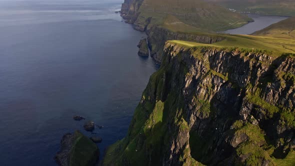 Drone Of Coastline And High Sea Cliff Beinisvord, Stock Footage | VideoHive