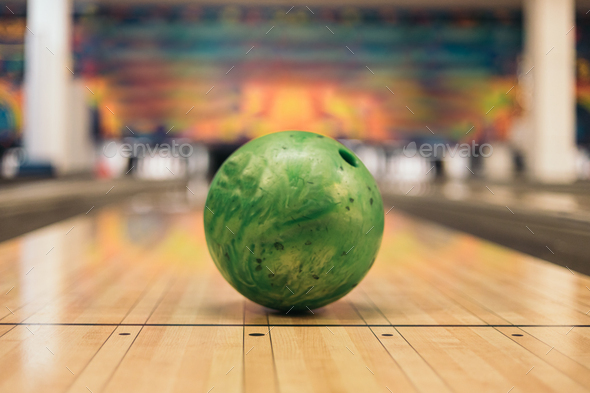 Green bowling ball on the track, active leisure game concept Stock ...