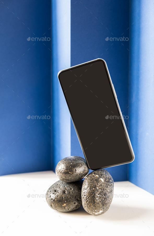 Composition of modern mobile phone with empty screen. Stock Photo by ...