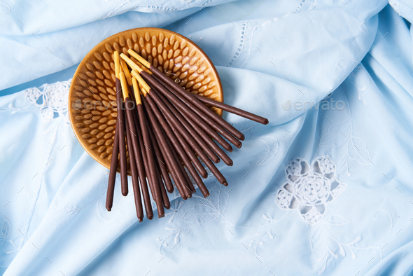 Set of Pocky on plate, popular japanese sweet. Stock Photo by FabianMontano