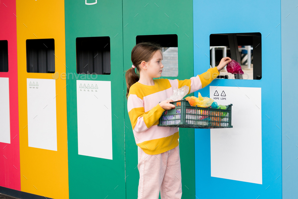 Girl holding box with different plastic bags. Kids throwing plastic ...