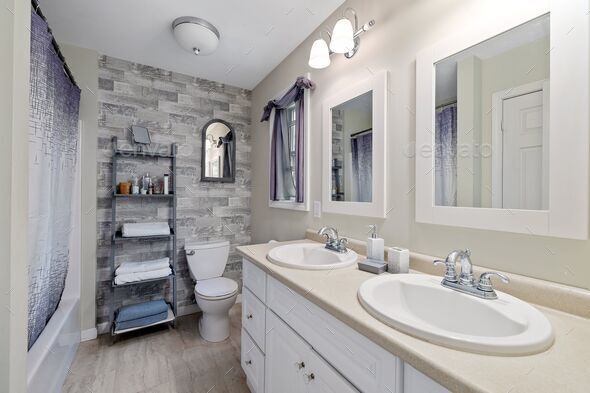 Modern designed restroom with white-painted walls and lavatories Stock ...