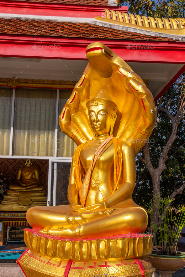 Saturday Buddha statue in Pattaya, Thailand Stock Photo by wirestock