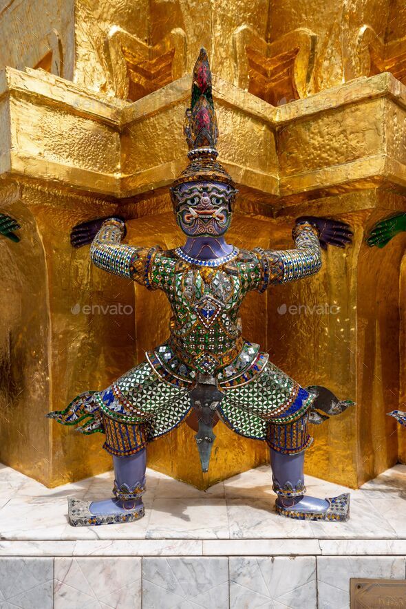 Vertical shot of the statue of a Hindu character Yaksha in The Grand ...