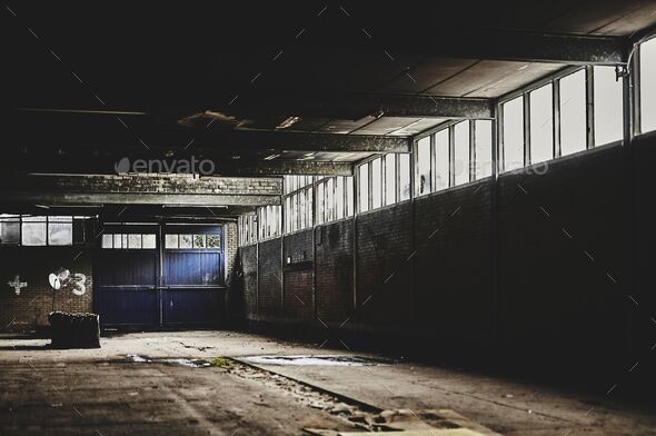 Interior of an empty old warehouse. Stock Photo by wirestock | PhotoDune