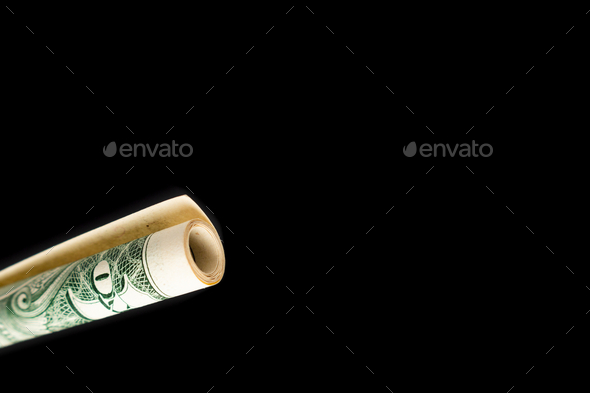 Closeup shot of one dollar bill roll isolated on a background Stock ...