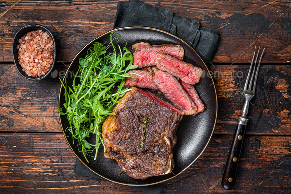 BBQ Grilled Wagyu New York beef meat steak or Striploin steak in a ...