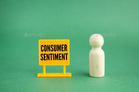 yellow signs and wooden figures with the words Consumer Sentiment Stock ...