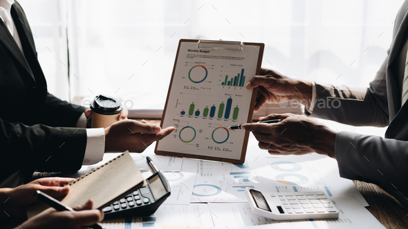 Business creative coworkers team Meeting Discussing showing the results ...