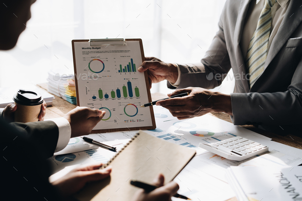 Business creative coworkers team Meeting Discussing showing the results ...