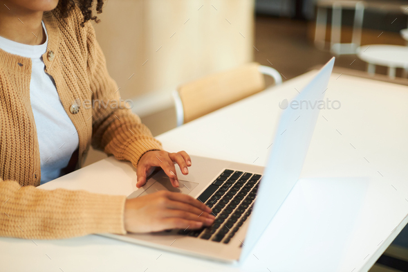 Closeup of copywriter hands typing on keyboard, using laptop working ...