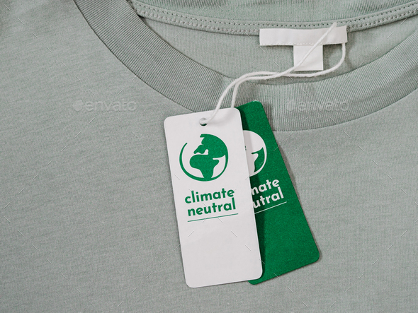 Climate neutral, carbon label on clothes concept Stock Photo by Fasci