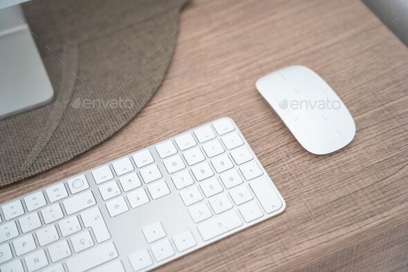 Modern workplace with desktop computer, working table, keyboard and ...