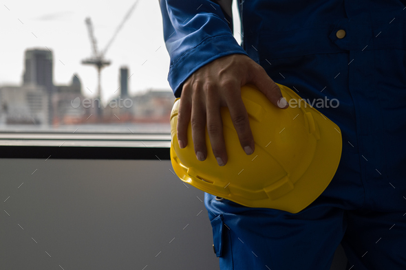 Engineer at building construction site, Safety first equipment Stock ...
