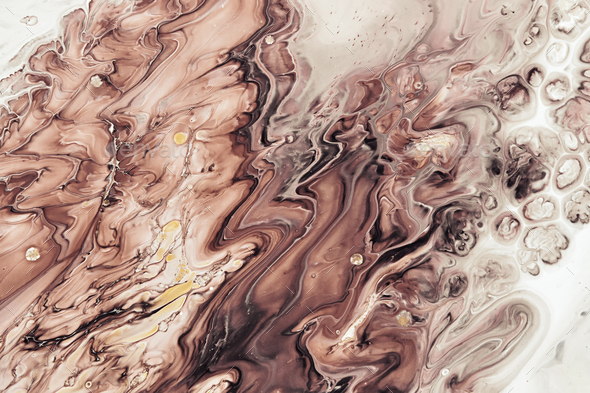 Fluid Art acrylic paints. Abstract mixing brown, black and white waves ...