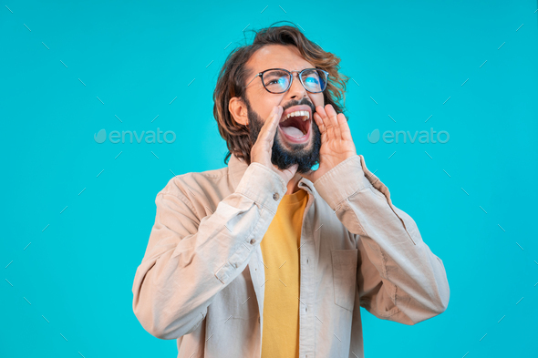 Man shouting loud calling attention with hands like megaphone isolated ...