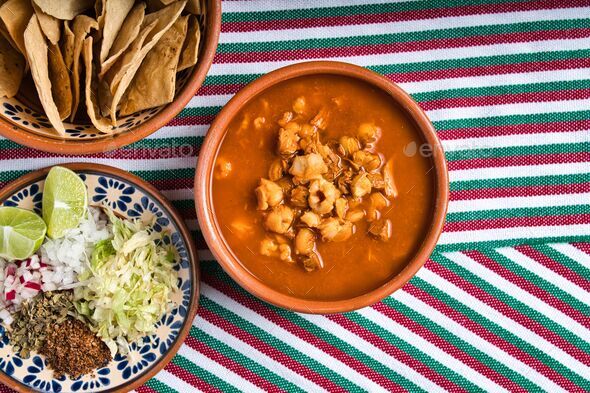 Top view of Pozole Rojo (Mexican Pork and Hominy Stew),tortilla chips ...