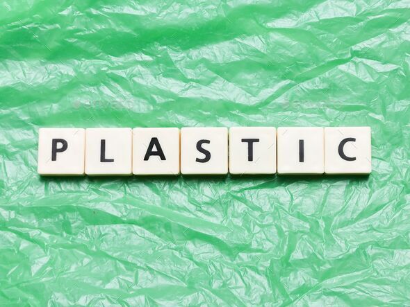 Word plastic made of square letter tiles on plastic bag. Stock Photo by ...