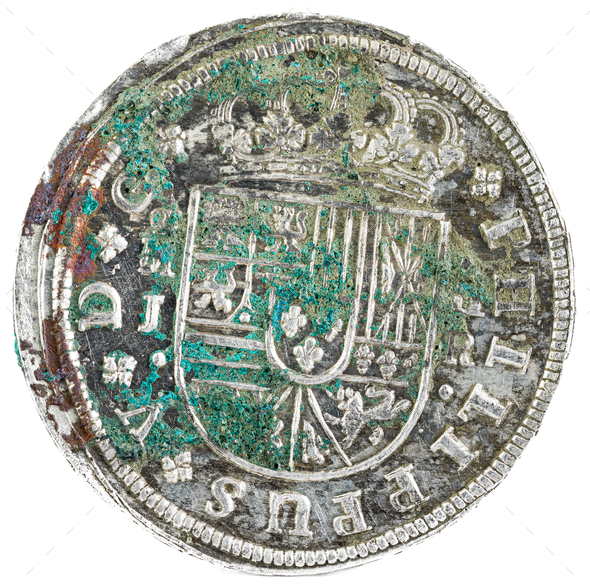 Ancient Spanish silver coin of the King Felipe V isolated on a white ...