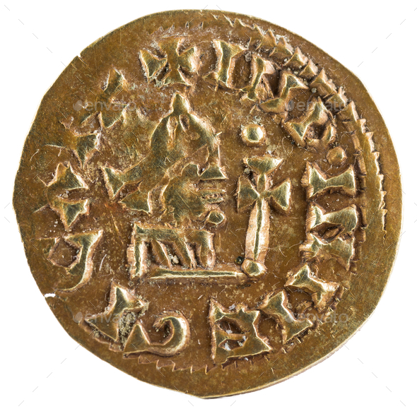 Ancient Visigothic gold coin of the king Egica isolated on a white ...
