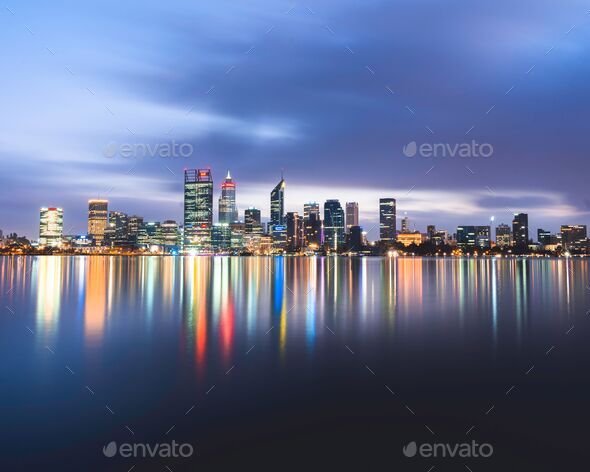 Perth skyline in Western Australia with the lights reflected in the ...