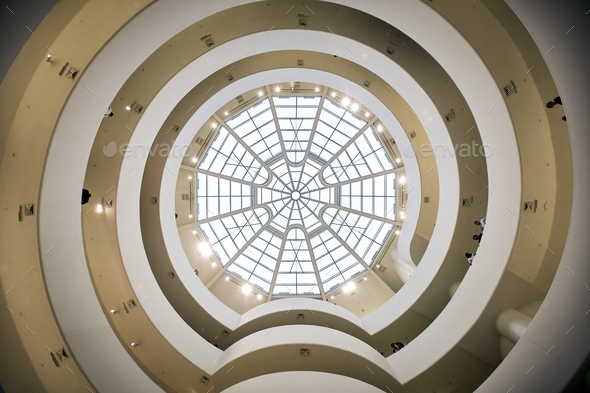 Low angle shot of a beautiful round glass roof in Solomon R. Guggenheim ...