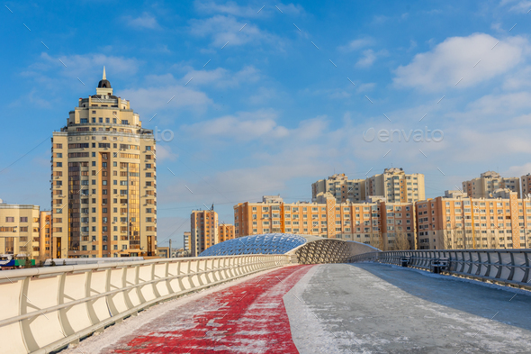 Modern architectural urbanistic Atyrau fish bridge across Ishim river ...