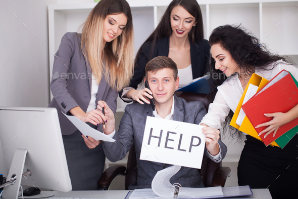 Portrait of tired man having long working day and needing help Stock ...