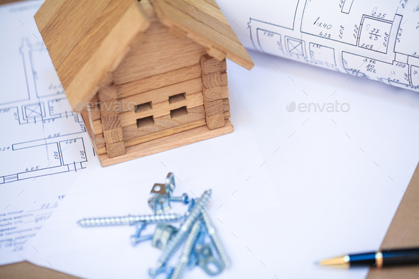 Building new home. Close up of house blueprint with building tools ...