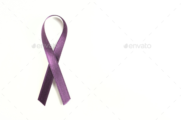 purple ribbon on a white background used to support people with ...
