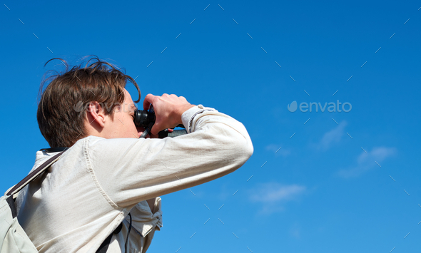 Close up of an attractive young explorer from Spain in a white shirt ...