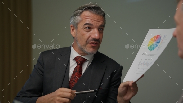 Professional businessman leader meeting with co-worker team in meeting ...