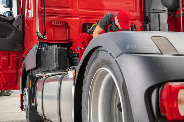 Professional Tractor Trucks Mechanic Performing Maintenance Stock Photo ...