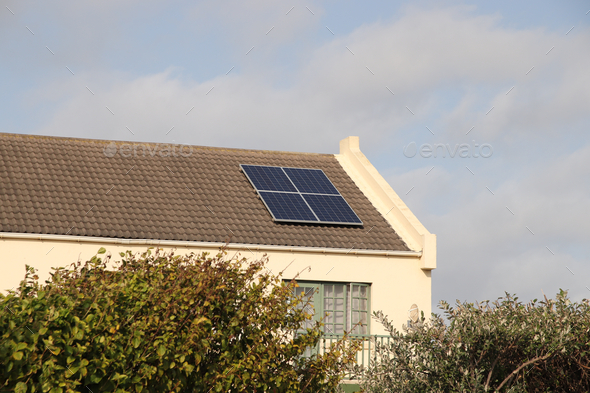 Solar panel on the rooftop of a house Stock Photo by wirestock | PhotoDune
