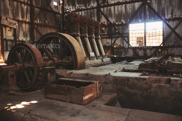 Disused rusty machines in a factory Stock Photo by wirestock | PhotoDune