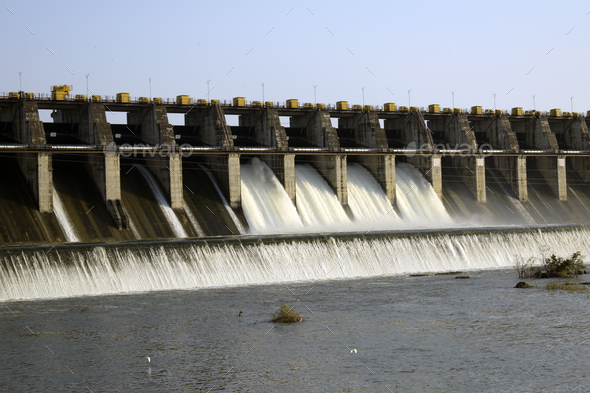 Beautiful view of the water streaming from the dam into the river Stock ...
