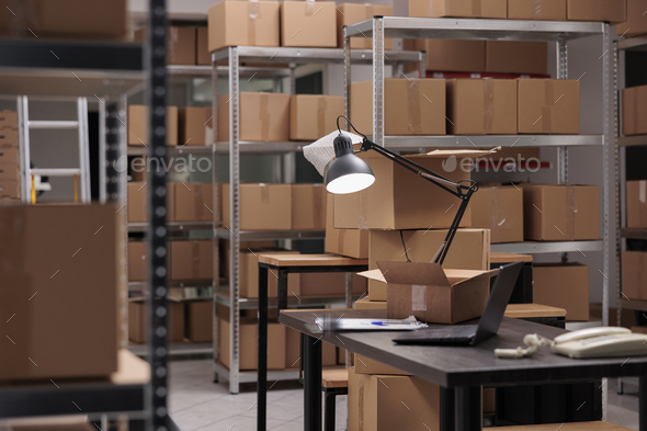 Empty warehouse delivery department full with rows of shelves with ...