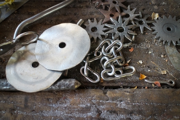Closeup shot of different types of gears on the ground Stock Photo by ...