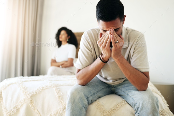 Crying, sad and couple in a conflict in the bedroom about depression ...