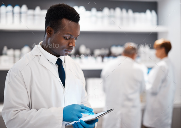 Science, black man and tablet with research, chemist and connection for ...