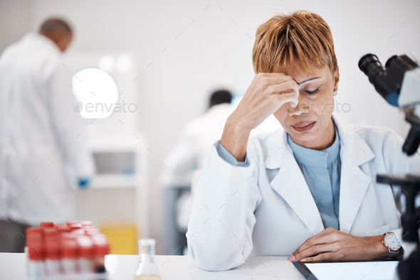Scientist with headache, stress and fatigue with woman, overworked with ...