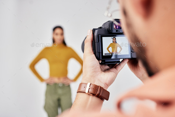 Camera, photography and photographer with woman fashion model in studio ...
