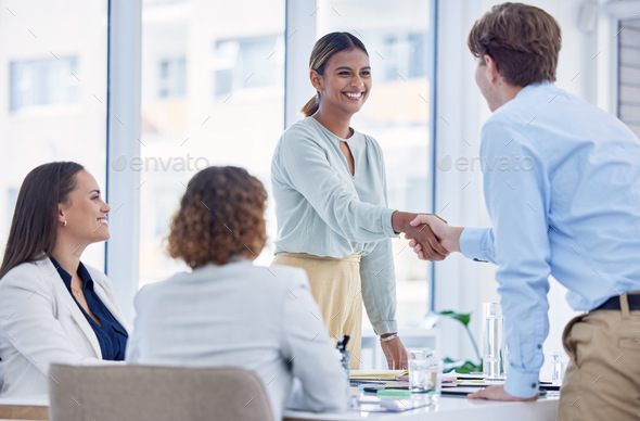 Business, handshake and staff in meeting, promotion and celebration in ...