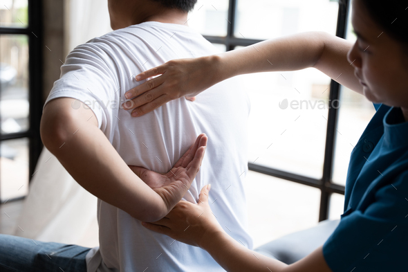 Physical therapy concept, Asian man is admitted to physiotherapy in a ...