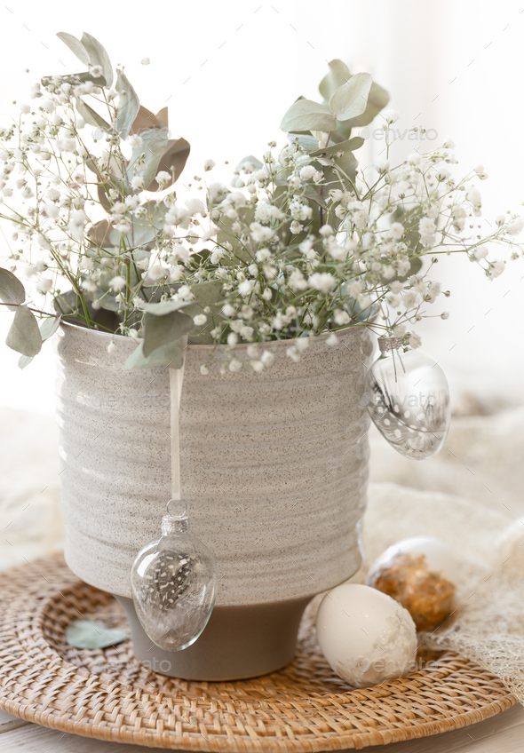 Light Easter composition with Easter eggs and gypsophila flowers. Stock ...