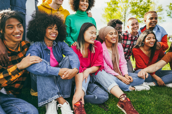 Young diverse people having fun outdoor laughing together outdoor ...